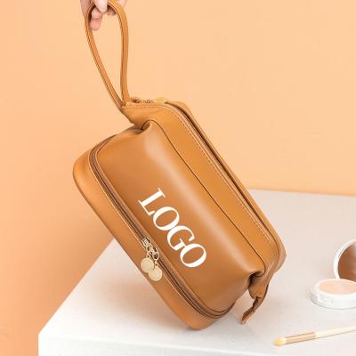 Cina Customized New Arrival Luxury Portable Pu Large White Leather Travel Toiletry Storage Makeup Cosmetic Bags With Logo in vendita