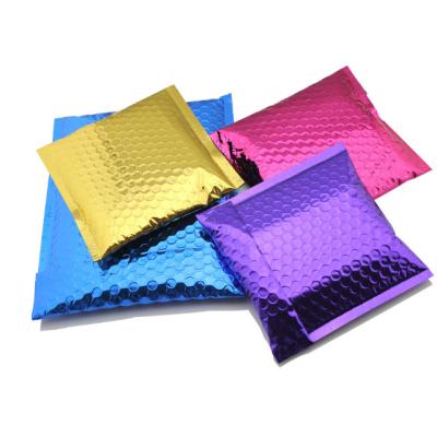 China Biodegradable Compostable Shipping Packaging Holographic Metallic Poly Bubble Mailer Padded Envelope for sale