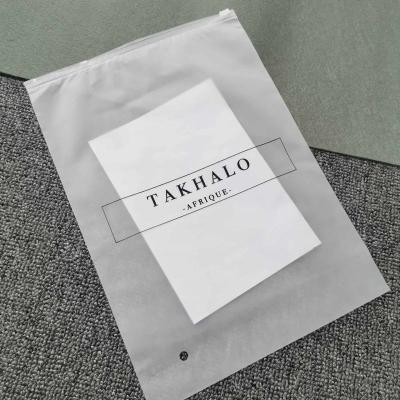 Cina Customized White Matte Frosted Peva Zipper Slider Plastic Bags Waterproof With Your Logo For Clothing Hoodies Packaging in vendita