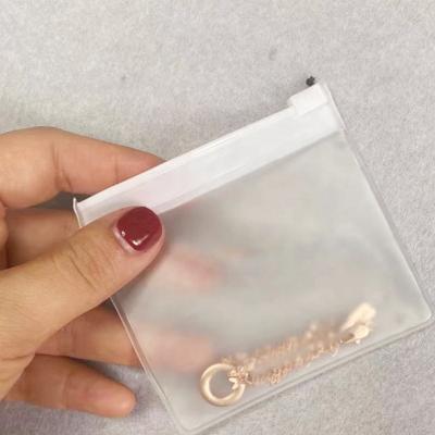 Cina Custom Logo Earring Necklace Packaging Zipper Bag Clear/Transparent Pvc Jewelry Cosmetic Ziplock Bag in vendita