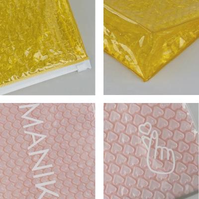 Cina Biodegradable Sustainable Packaging Eco Friendly Waterproof Travel Makeup Bag Clear Pink Bubbles Makeup Pouch in vendita