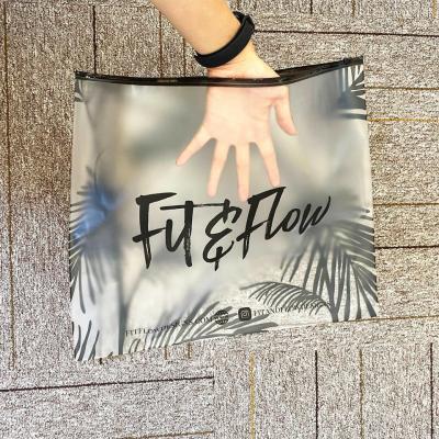 Cina Custom Printed Logo Frosted Plastic Bag Clothes Zip Lock Self Sealing Bag Clothing Packaging Frosted Zipper Bags in vendita