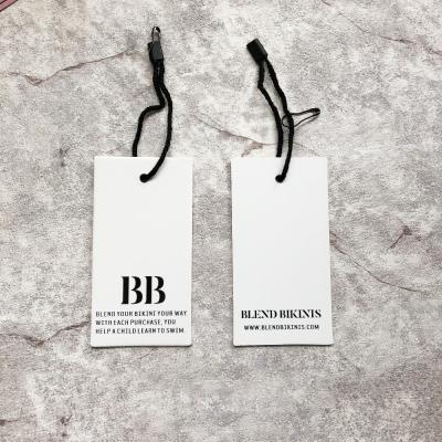 China Luxury Custom Logo Clothing Tags With Your Own Logo Foil Printing/Private Swing Tags For Clothing for sale