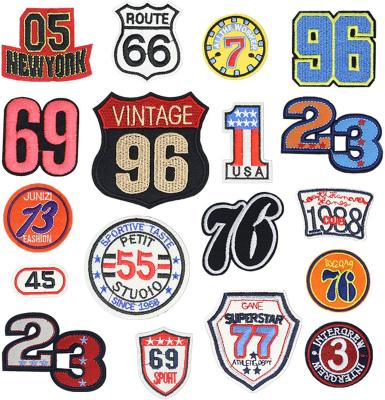 China Custom Logo Embroidery Patches Wholesale Heat Press Designer Woven Patches Iron On Woven Hat Patches Embroidered For Clothes for sale