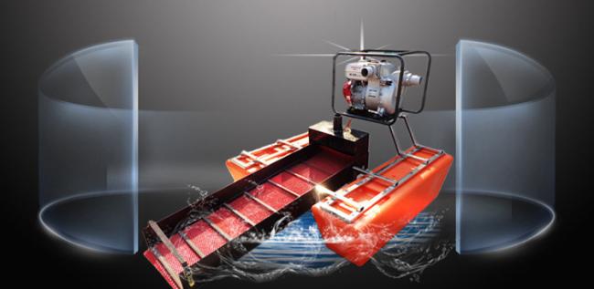 Mini gold dredger working in river
