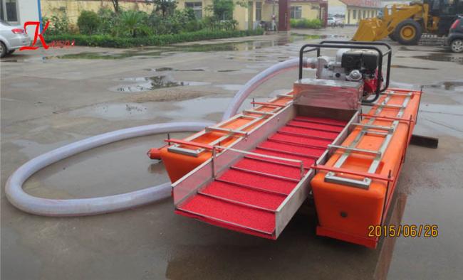 Close-up of mini gold dredger components
