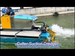 compact amphibious weed harvester with aluminum alloy body, stern drive engine