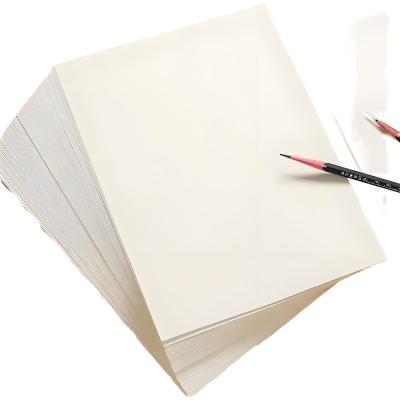 China 787x1092mm Uncoated Cream Color 70g Bond Paper 55-250 Gsm Woodfree Offset Printing Paper Sheets Packing for sale