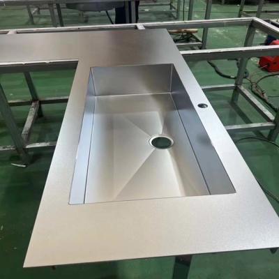 Chine Fabrique 304 Ligne de cheveux brossé en relief Perles de soufflage en acier inoxydable pour bureau de cuisine à vendre