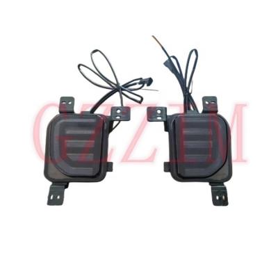 China Luce del paraurti posteriore rossa per Ford Everest 2022 Lampada posteriore a tre colori ABS plastica for sale