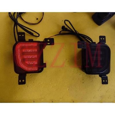 Cina Luce del paraurti posteriore rossa per Ford Everest 2022 Lampada posteriore a tre colori ABS plastica in vendita