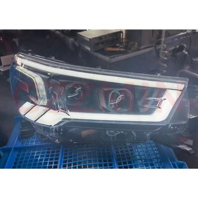 Cina Faretti a LED di plastica per auto nera per Toyota HILUX REVO ROCCO in vendita