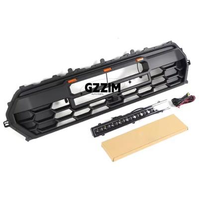 China Toyota Tacoma 2024 ABS Mesh Front Grille With Light Bar Black Car Grille Front Middle Grille for sale