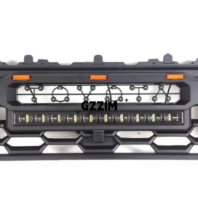 China Toyota Tacoma 2024 ABS Mesh Front Grille With Light Bar Black Car Grille Front Middle Grille for sale