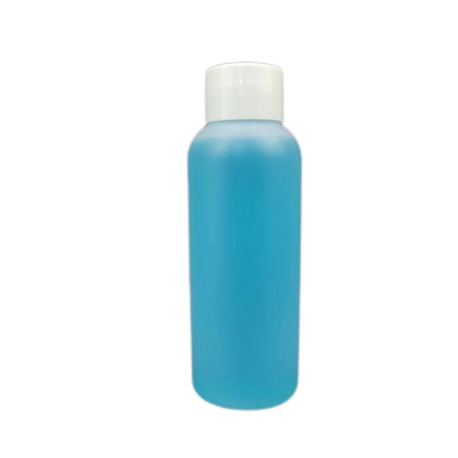 Close-up of DTF cleaning solution bottle