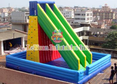 China Outdoor Inflatable Climbing Wall With Water Slide Safety Obstacle Course for sale