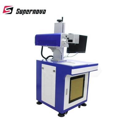 中国 110V / 220V 30Wの二酸化炭素レーザーの印機械非金属レーザーのマーカーの彫刻家 販売のため