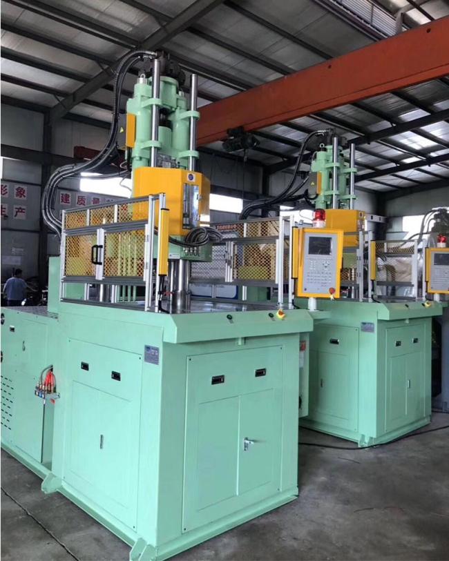55 Ton double color rotary table vertical injection molding machine