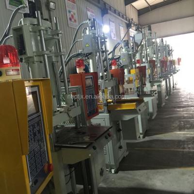 China VERTICAL Bumper Injection Molding Machine PVC Vertical Car Molding Making Machine for sale