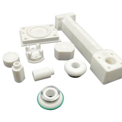Cina Resistenza all'usura allo stampaggio Parti in PTFE in plastica CNC riempite di carbonio per la tornitura pura in vendita