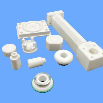 China Hoogtemperatuurbestendige kunststof PTFE-bewerking Speciale bewerking Gevormde onderdelen met grafietvulling Te koop