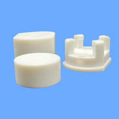 China Hoogtemperatuurbestendige kunststof PTFE-bewerking Speciale bewerking Gevormde onderdelen met grafietvulling Te koop