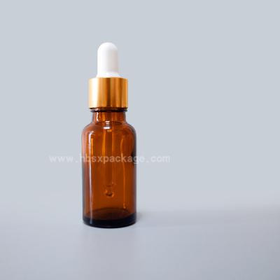 China 15ml clear amber color glass essential oil bottle with insert and tamper proof cap  for essential oil for sale