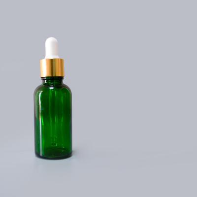 China Made in china 30ml green essential oil glass amber bottle with dropper from Shengxiang for sale