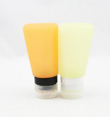 China 80ml Triangle Shape Silicone Travel Bottle Shampoo Containers Cream Bottle for sale