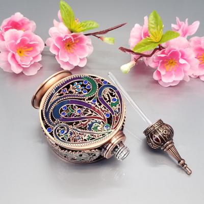 China Hebei Shengxiang Beautiful New design 12mL crystal and metal top gear essential oil bottle for sale