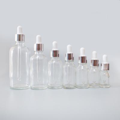 China 50ml clear glass essential oil bottle with pipette dropper and a white band and a white top for sale