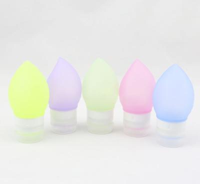 China 80ml Triangle Shape Silicone Travel Bottle Shampoo Containers Cream Bottle for sale
