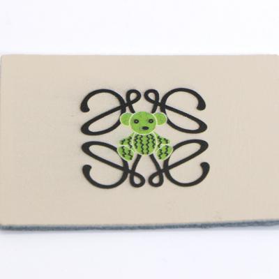 Cina Toppe di cuoio reali di timbratura calde su ordinazione delle etichette di Logo Printing per il cappello di Abd dei vestiti in vendita