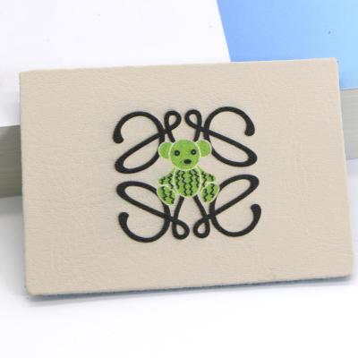 Cina Toppe di cuoio reali di timbratura calde su ordinazione delle etichette di Logo Printing per il cappello di Abd dei vestiti in vendita