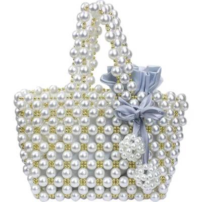 Cina La perla di tessitura della mano ha bordato il modo della borsa lavora all'uncinetto il ODM dell'OEM d'argento bianco di colore in vendita