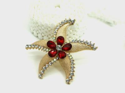 Cina Cinque perni aguzzi della fibula della stella per il ODM dell'OEM del diamante intarsiato oro dei vestiti in vendita