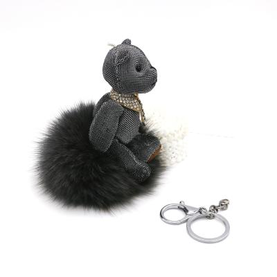 Cina la chiave Ring Silver Reflective Cloth Material della bambola dell'orso 3D ha riempito la dimensione del cotone 13cm in vendita