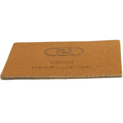 Cina Marrone riveste di pelle le toppe per il ODM di dimensione di logo 8cm×5cm di tensione dei vestiti in vendita