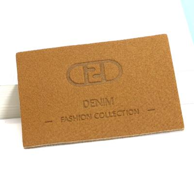 Cina Marrone riveste di pelle le toppe per il ODM di dimensione di logo 8cm×5cm di tensione dei vestiti in vendita