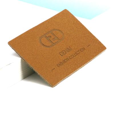 Cina Marrone riveste di pelle le toppe per il ODM di dimensione di logo 8cm×5cm di tensione dei vestiti in vendita