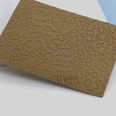 Cina Toppe di cuoio urgenti calde per l'OEM di Logo Pattern della lettera dei vestiti in vendita