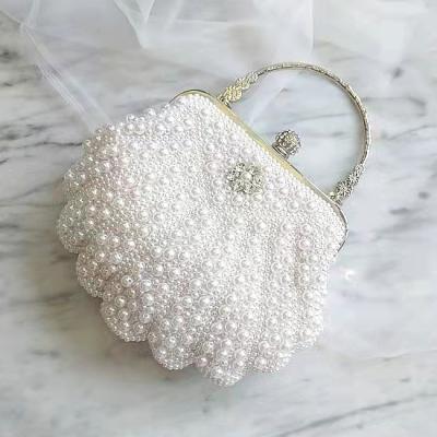 Cina Shell Shape Pearl Hand Bags bianca tessuta a mano per altezza di lunghezza 18cm delle donne 22cm in vendita