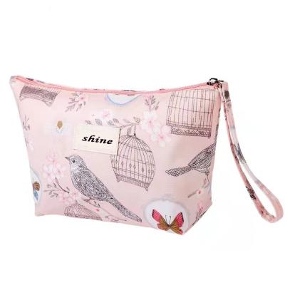 Cina ODM dell'OEM molle stampato rosa del materiale del tessuto della tela del modello animale cosmetico della borsa della chiusura lampo in vendita
