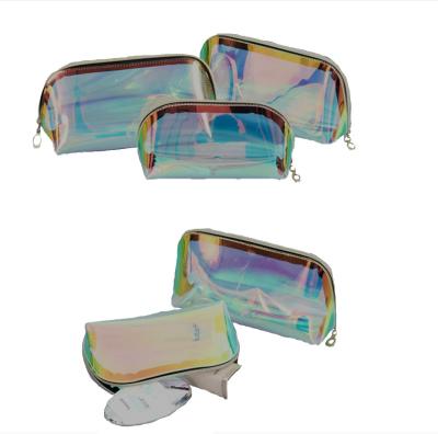 Cina Materiale trasparente di colore del laser della borsa cosmetica magica TPU della chiusura lampo impermeabile in vendita