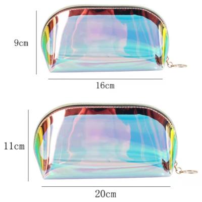 Cina Materiale trasparente di colore del laser della borsa cosmetica magica TPU della chiusura lampo impermeabile in vendita
