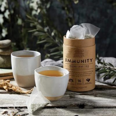 China Embalaje cilíndrico de bolsas de té biodegradables, latas redondas de cartón, tubo de papel de té reciclado para alimentos y café en venta