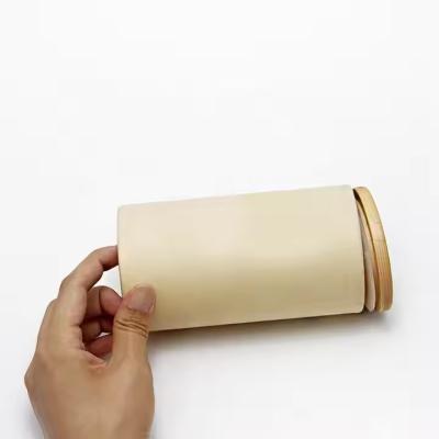 China Recipiente Hermético de Chá em Papel Kraft com Tampa de Cortiça Tubo Cilindro para Embalagem de Alimentos Doces Artesanato Biscoitos Superfície em Relevo à venda