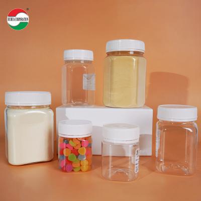 China Wholesale 250g 500g 1000g Plastic Square Round Clear Bottle PET Material Food Grade Honey Container with Screw Cap Honey Jars for sale