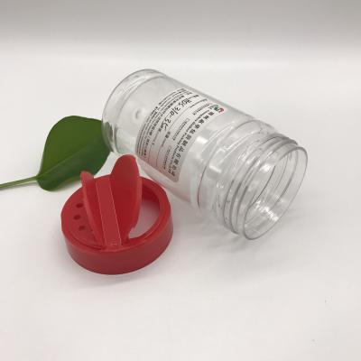 China 310ml Clear Plastic Cylinder , Pet Salt Shaker Spice Jar With Double Open Flip Cap for sale