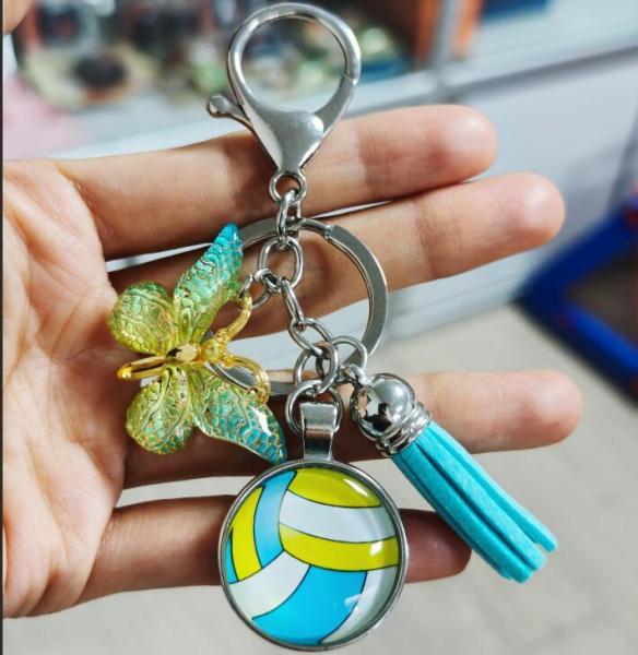 Quality GUGEER Fashion Volleyball Bag Charms Letter Keychain Tassel Butterfly Pendant Key Ring for Purse Handbags Women Girl for sale